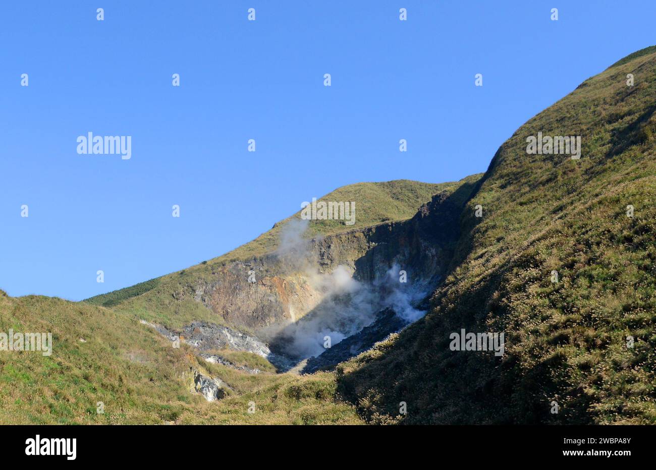 A distant view of the fumarole of Xiaoyoukeng at Yangmingshan National ...