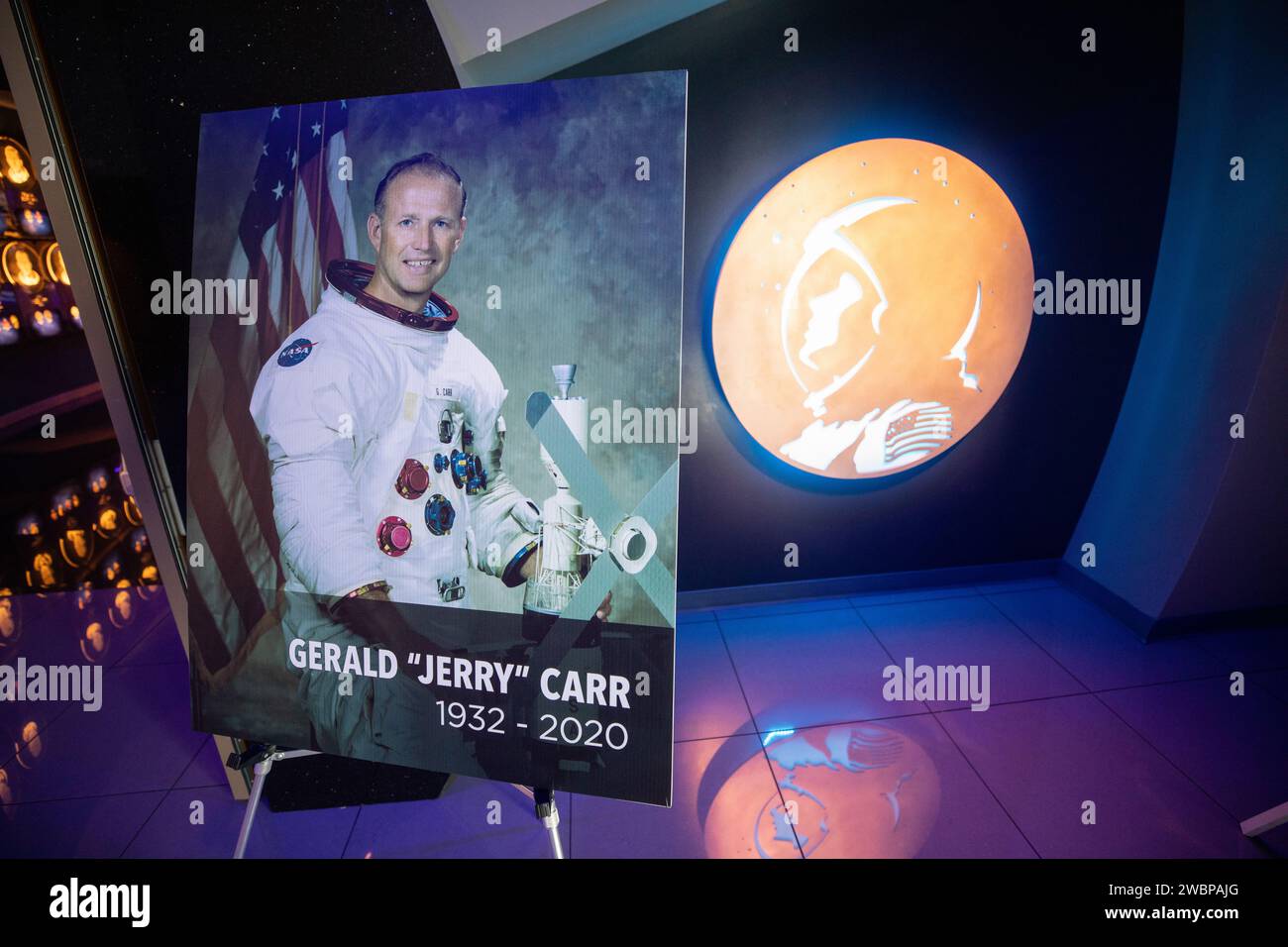 A photo of former NASA astronaut Gerald “Jerry” Carr is displayed ...
