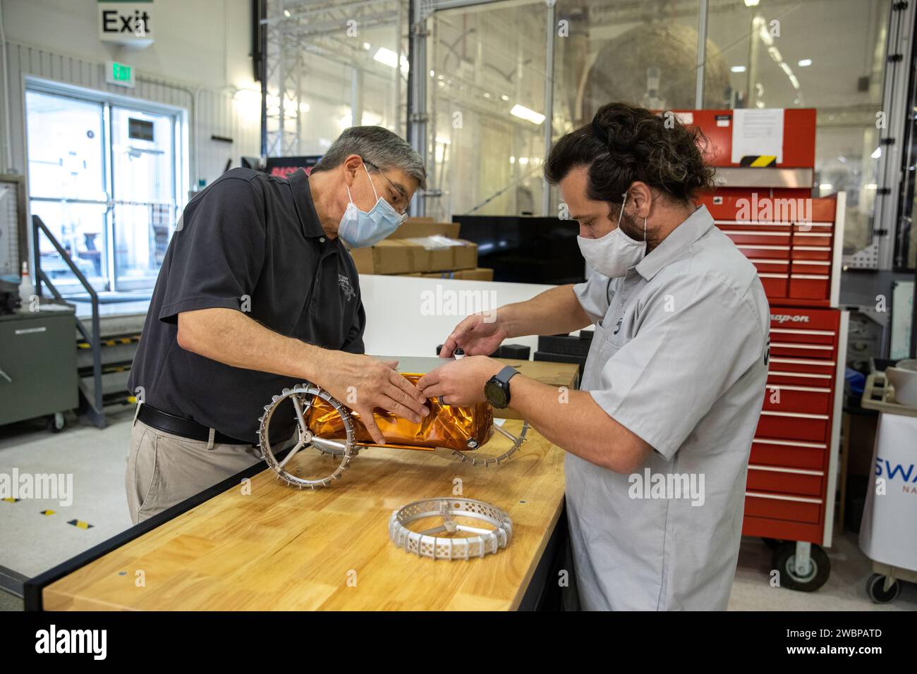 Jim Mantovani and A.J. Nick prepared CubeRover at Kennedy Space Center ...