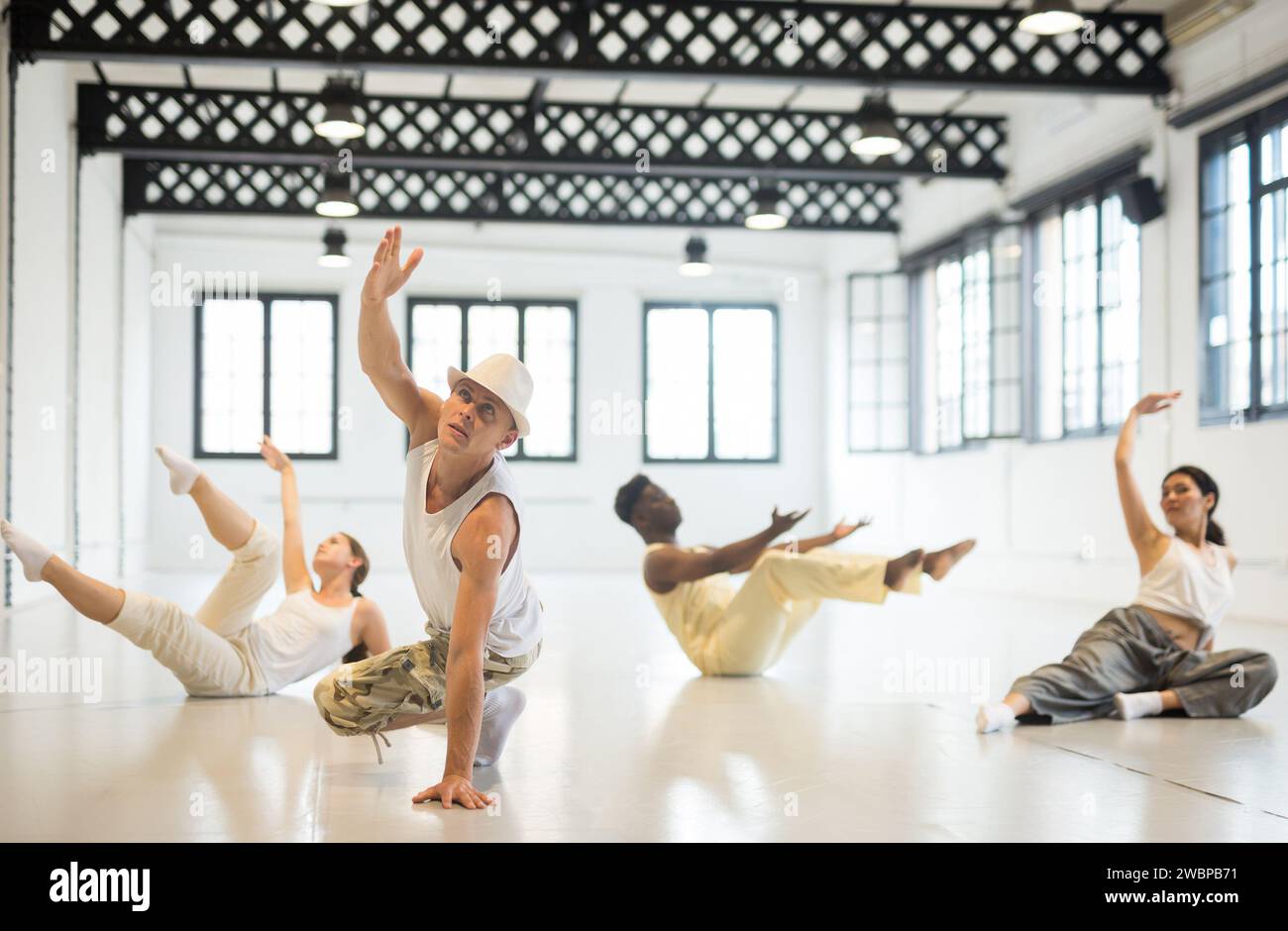 Team of artists performing spectacle scene Stock Photo - Alamy
