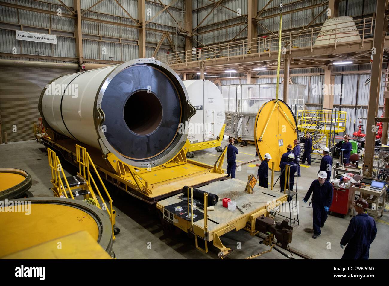Engineers and technicians process and inspect the propellant of the ...