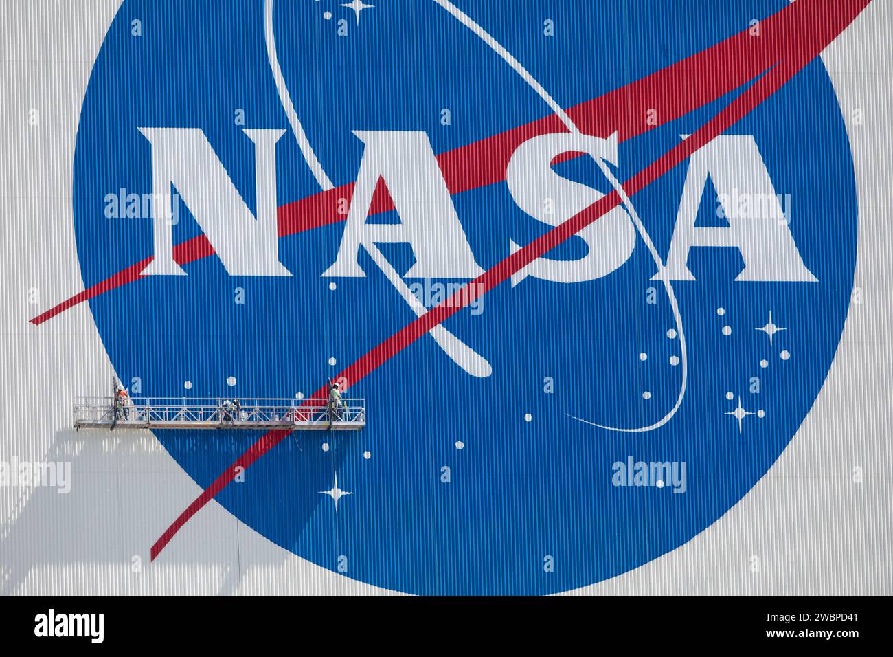 Painting of the NASA logo, also called the meatball, continues on the ...