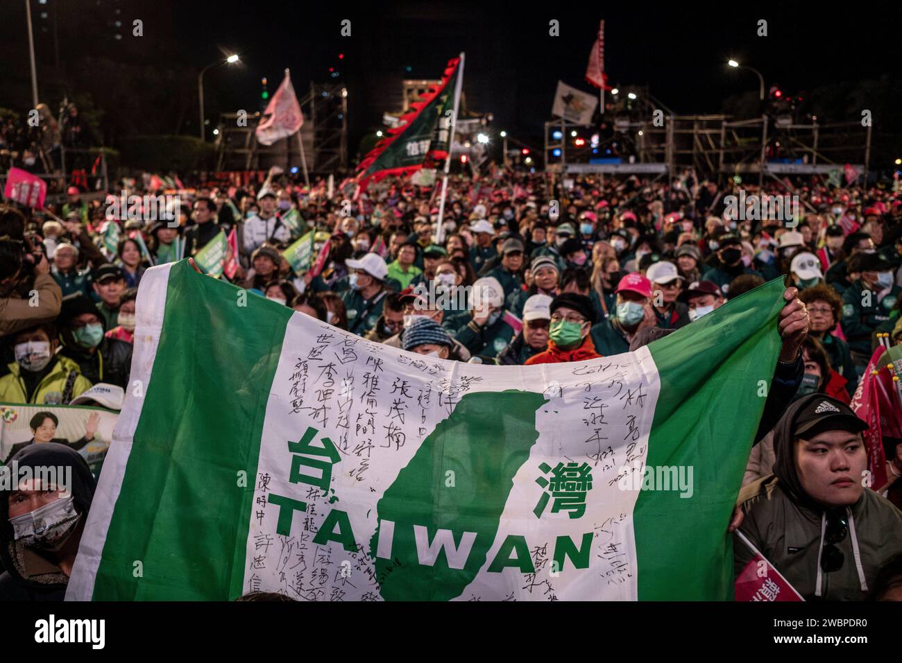 Taiwan, Jan 11, 2024. Supporters holding a Taiwan flag with TPP ...