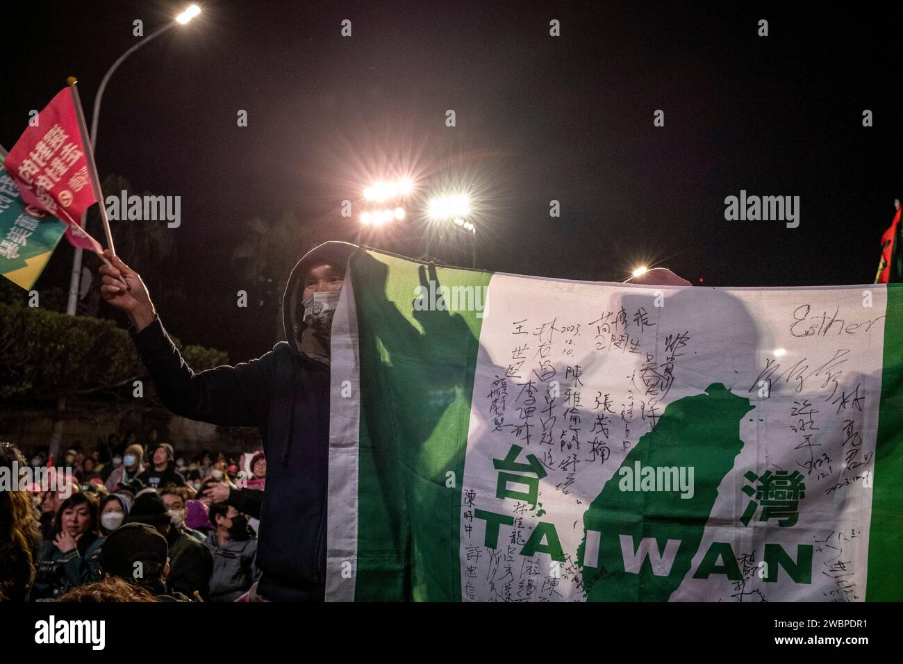 Taiwan, Jan 11, 2024. Supporters holding a Taiwan flag with TPP ...