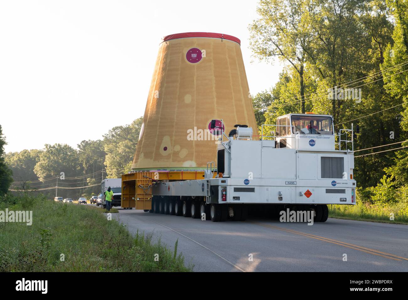 The move team loads the launch vehicle stage adapter, part of the ...