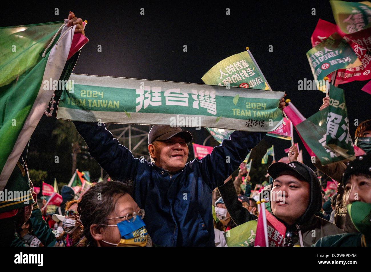 Taiwan, Jan 11, 2024. A supporter showed his banner during the rally at ...