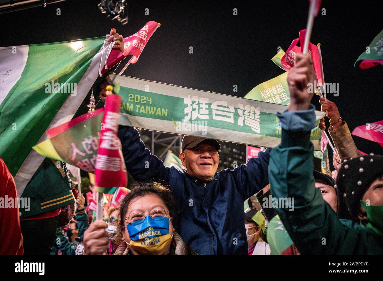 Taiwan, Jan 11, 2024. Supporter showed his banner during the TPP rally ...