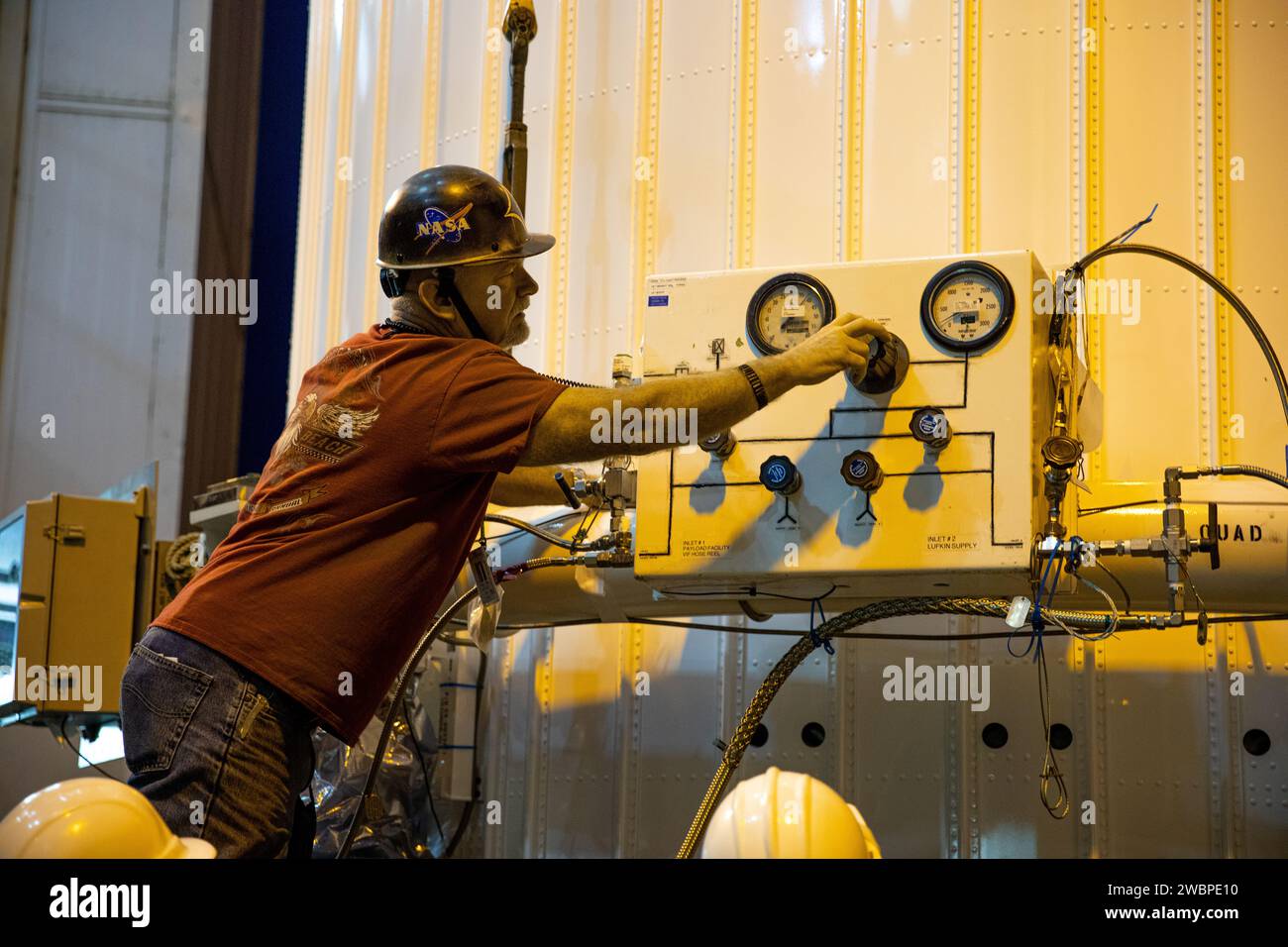 A worker prepares for mate operations of the Solar Orbiter spacecraft ...