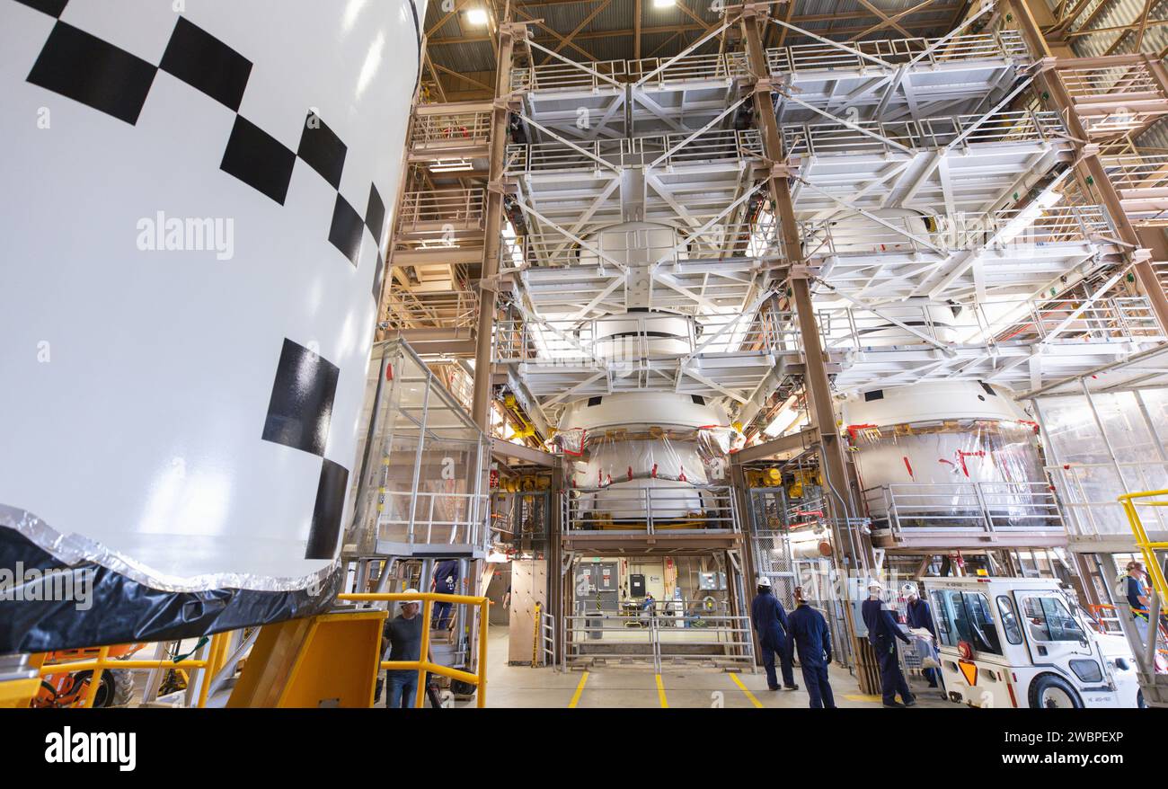 Technicians with Exploration Ground Systems perform inspections of the ...