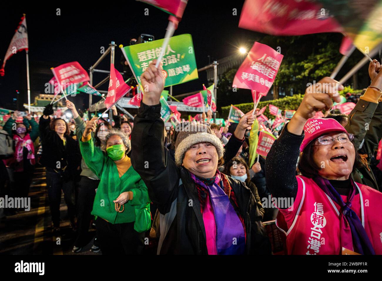 Taiwan, Jan 11, 2024. Supporters were cheering as they wave their flags ...