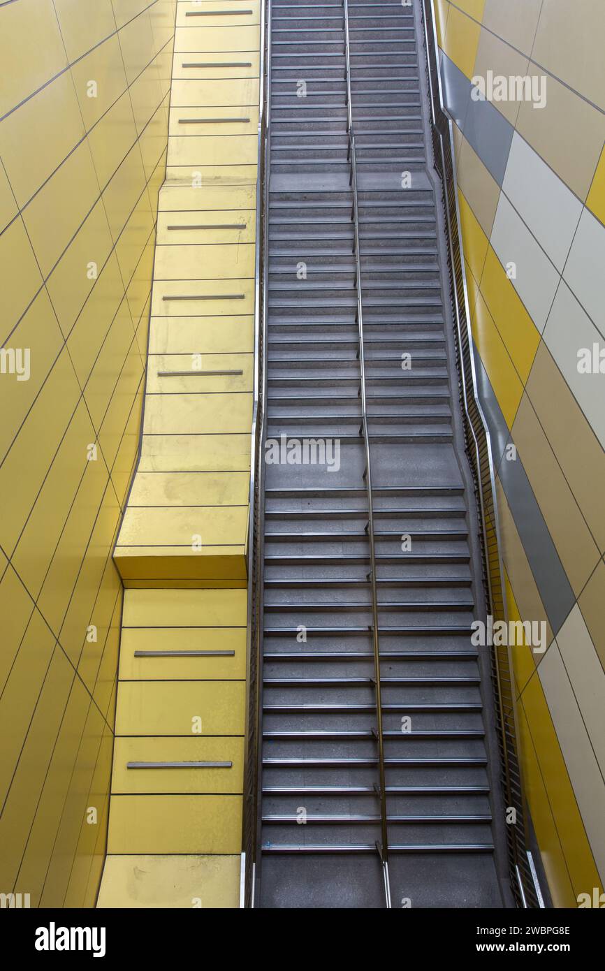 Long flight of staircase infrastructure at a train station, the stairs ...