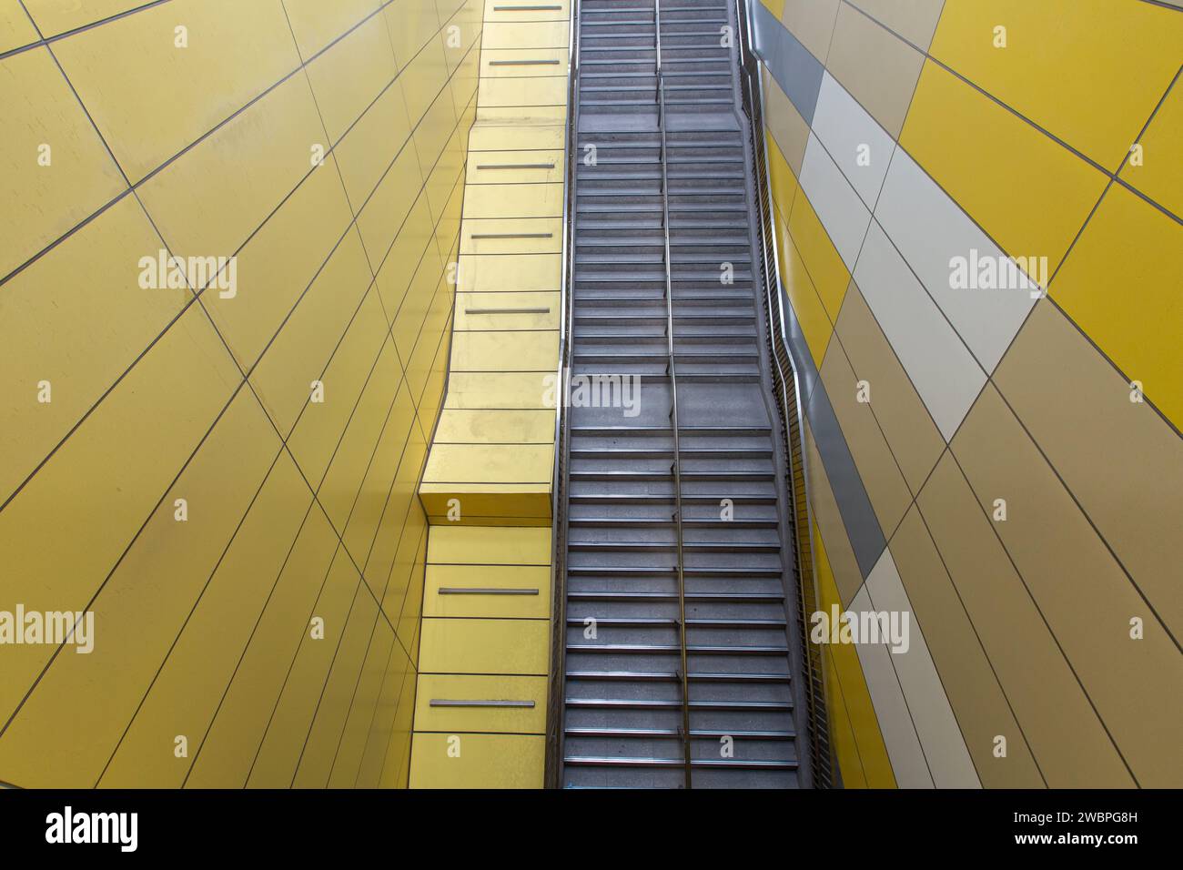 Long flight of staircase infrastructure at a train station, the stairs ...