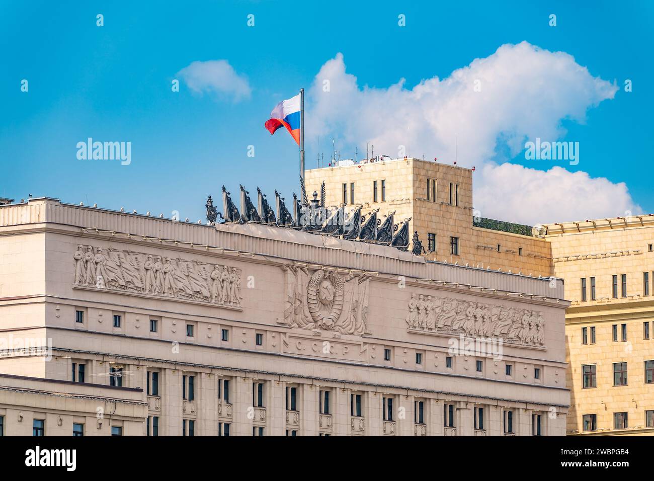 Waving national flag of russian federation on top of government stalin ...