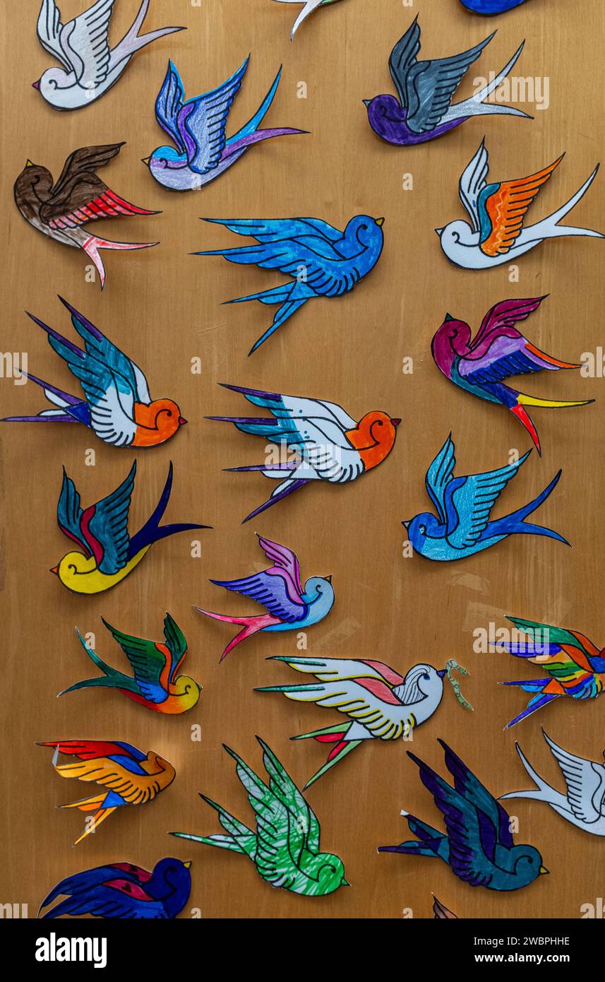 children's paper birds on display in South Broadway Cultural Center ...