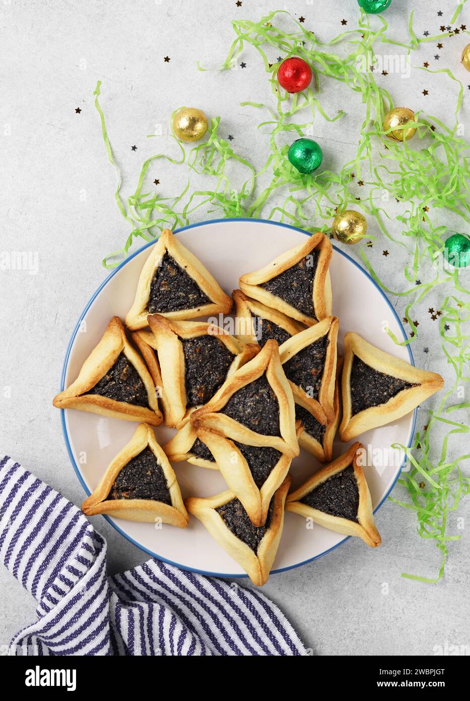 Traditional Jewish Hamantaschen cookies on the plate.Purim celebration ...