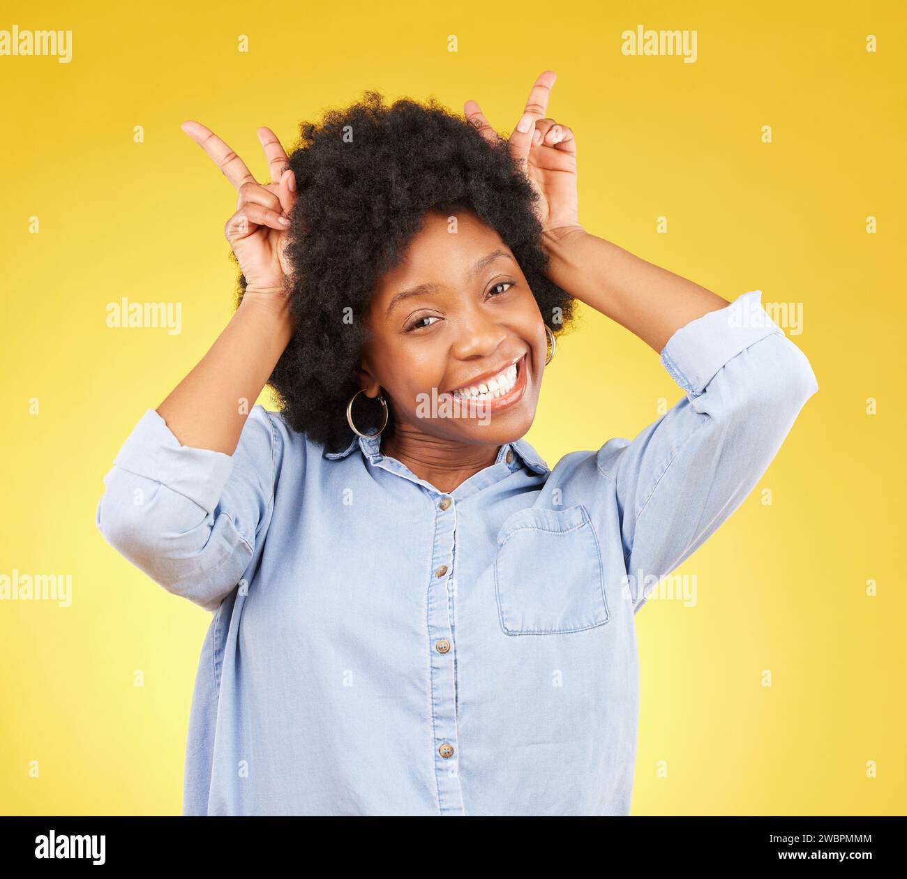 Goofy, happy and portrait of a black woman in a studio with a silly ...