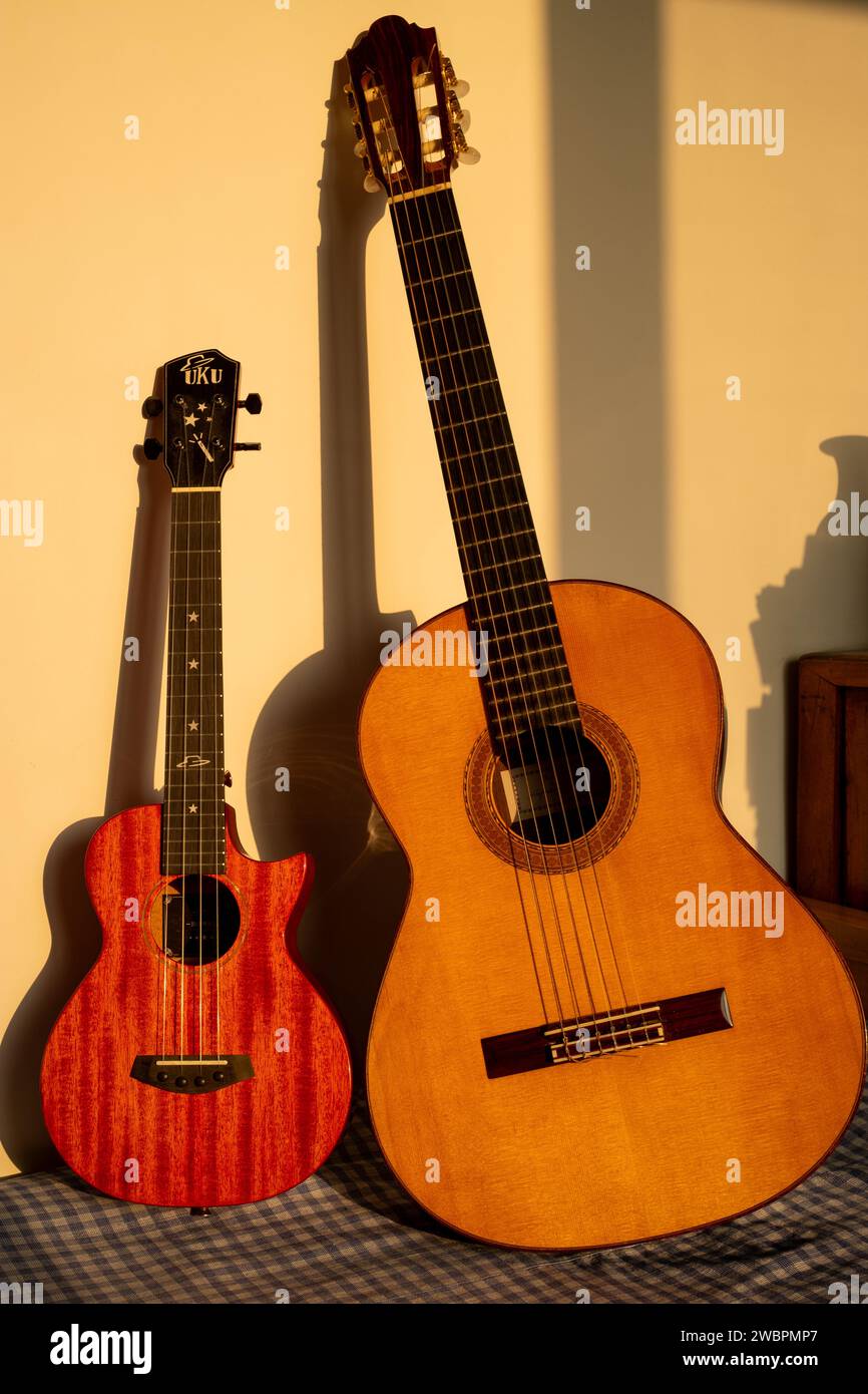 A guitar and a ukulele Stock Photo - Alamy