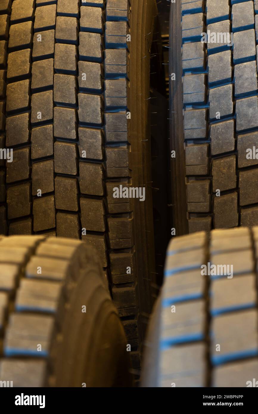 four spare tires, brand new stacked in a row for later replacement ...