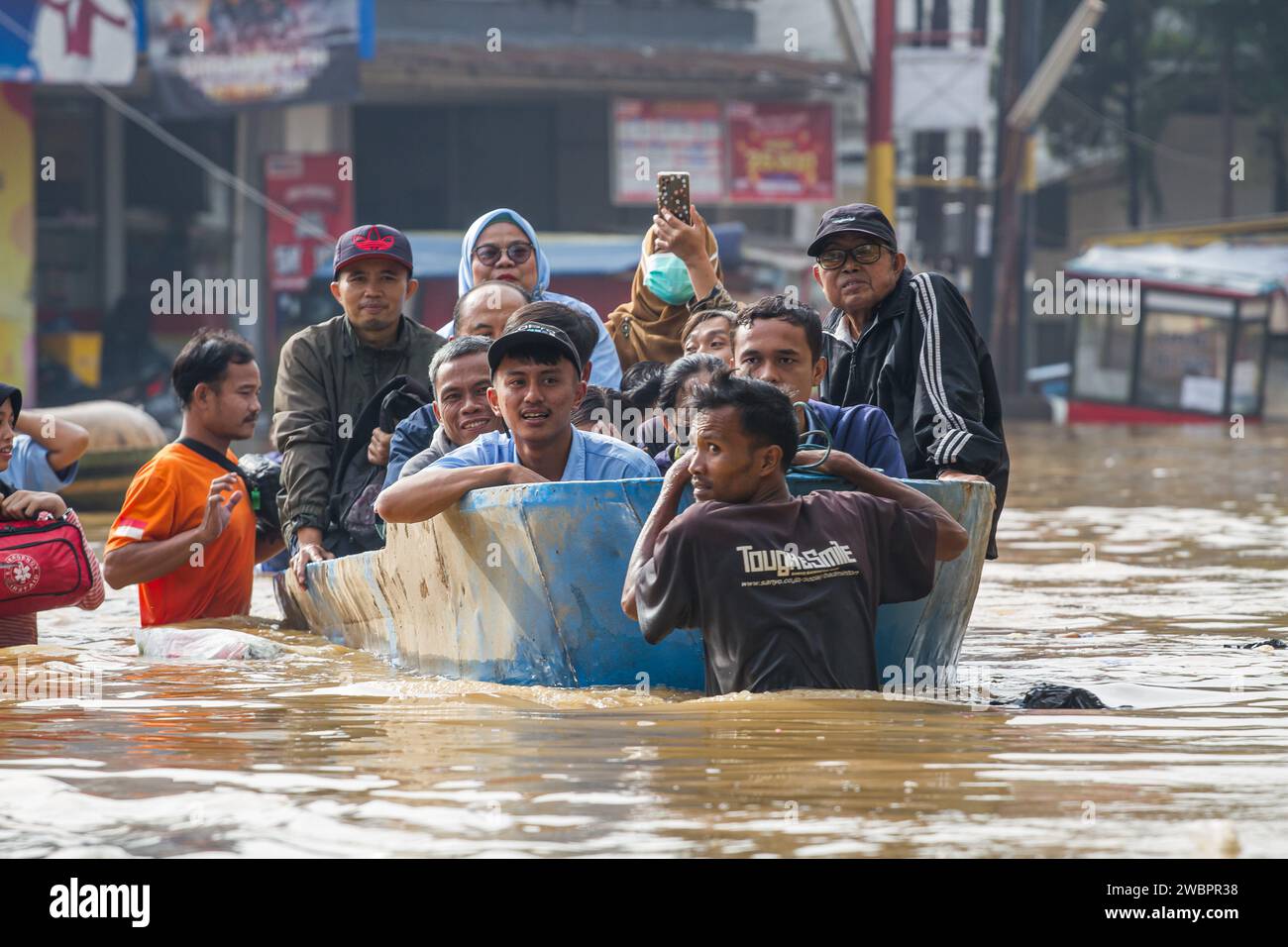Bandung, West Java, Indonesia. 11th Jan, 2024. People use a boat during ...