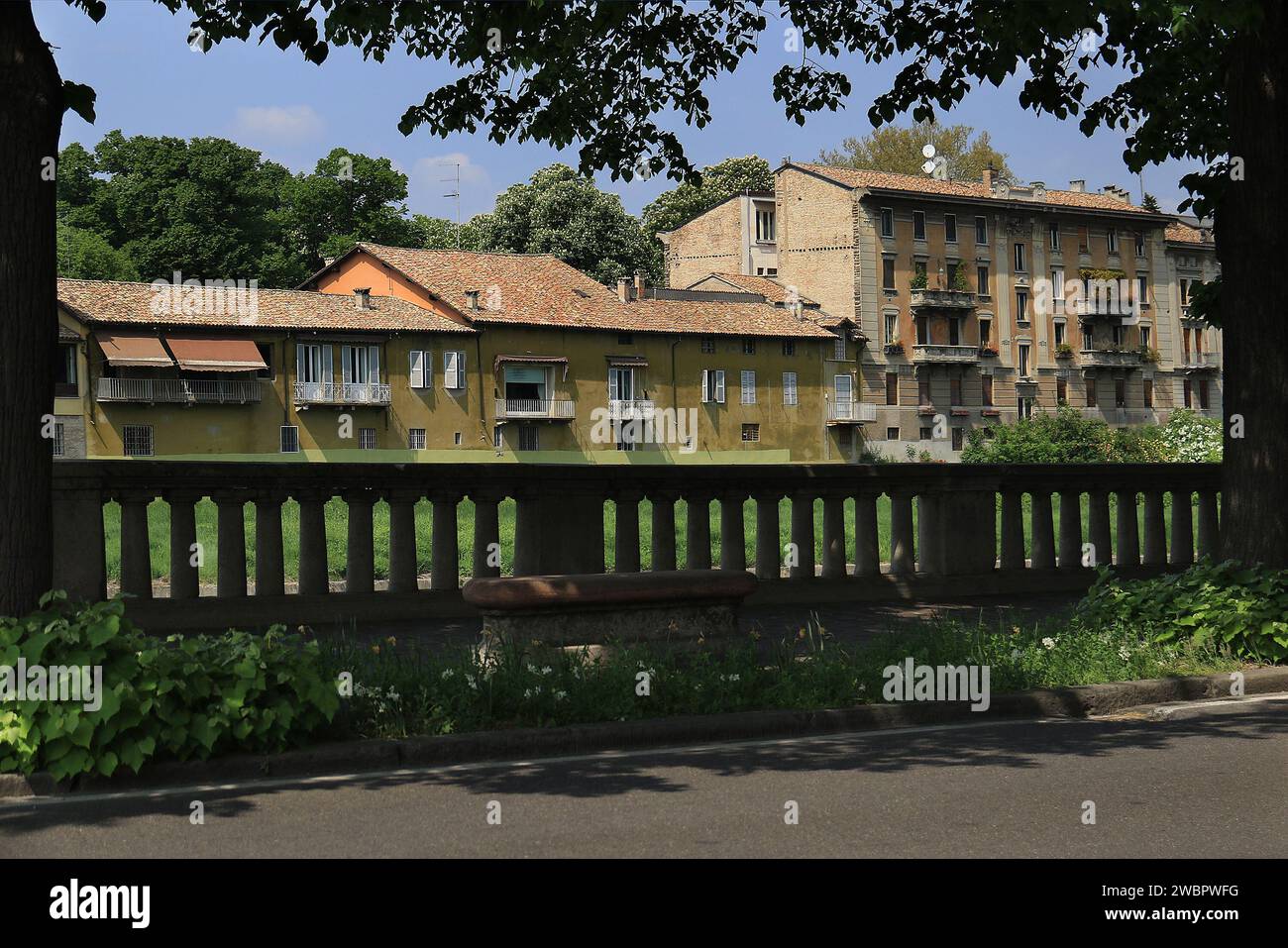 Houses along the river bank of Parma, Italy Stock Photo - Alamy