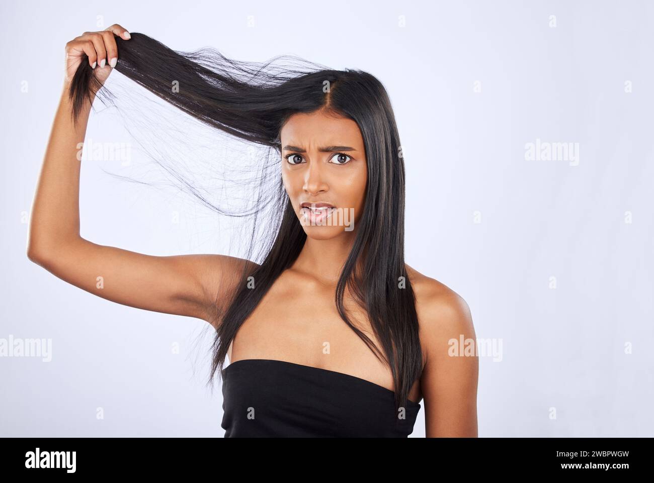 Hair damage, breakage and portrait of a frustrated woman isolated on a ...