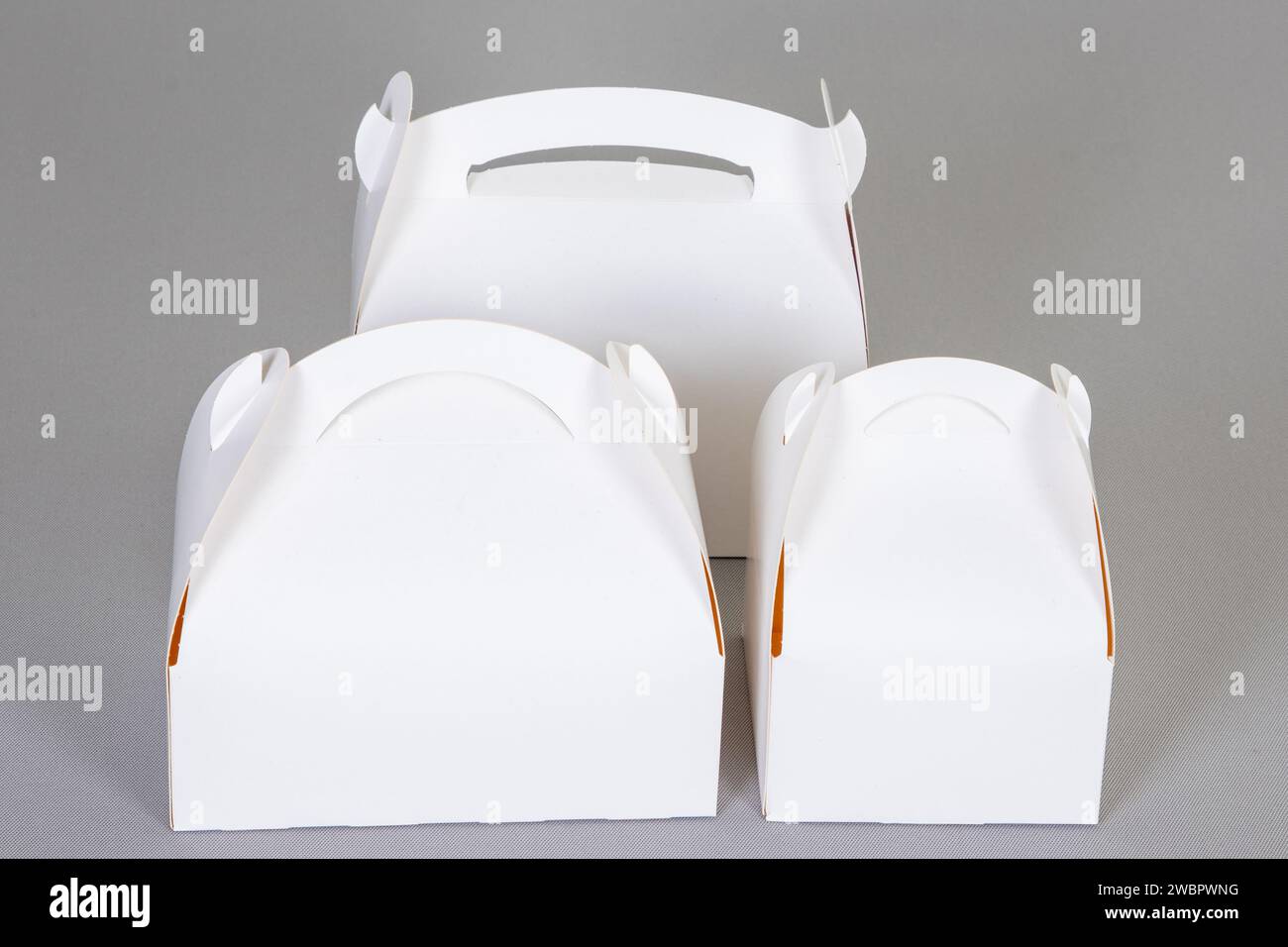 three mockup white pastry boxes blank paper packaging for bakery large ...