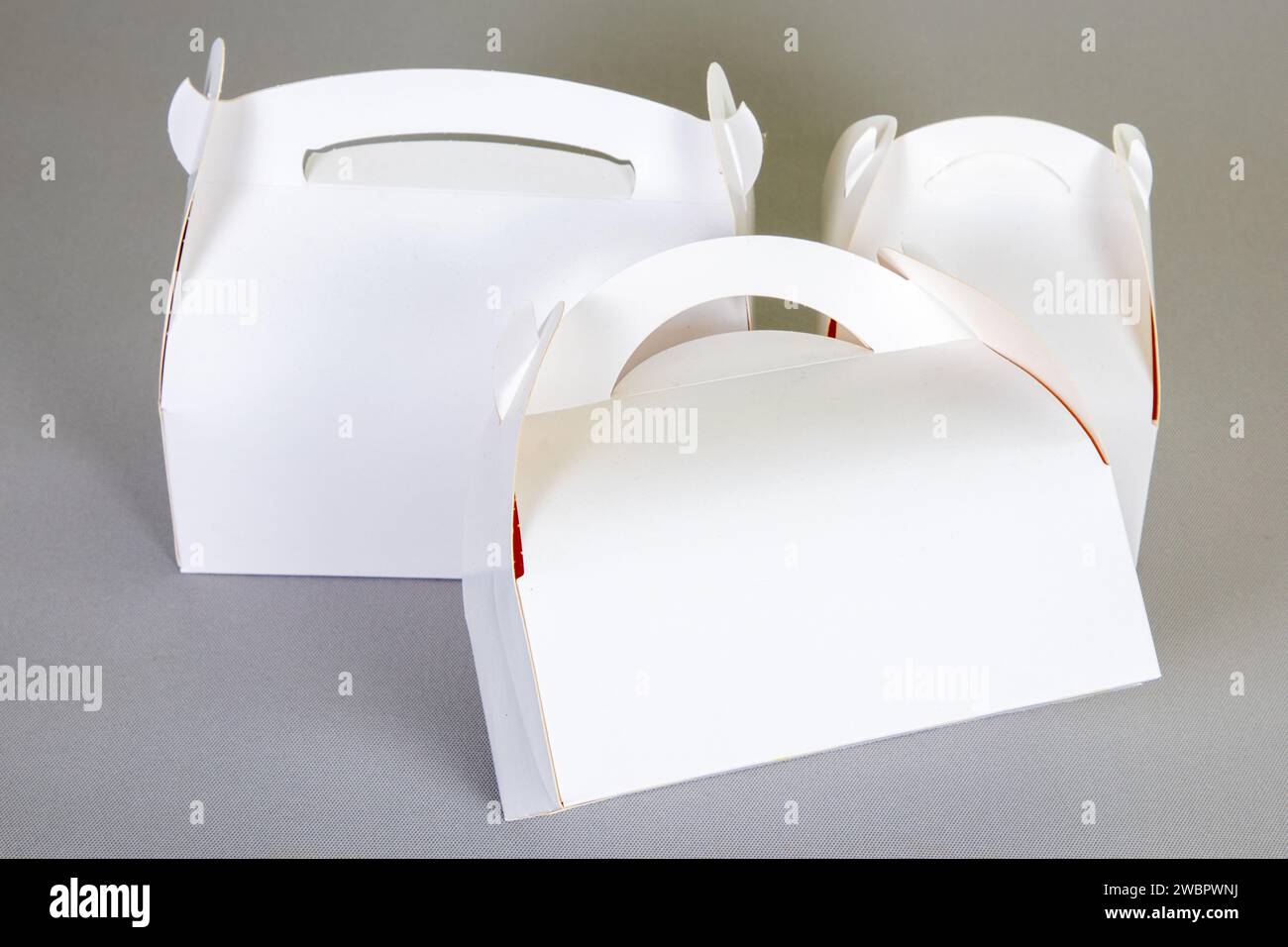 mock up closed three white cardboard blank pastry box cake on grey ...