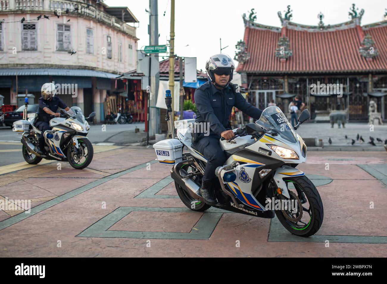George Town, Penang, Malaysia - January 10, 2024: Police officers being ...