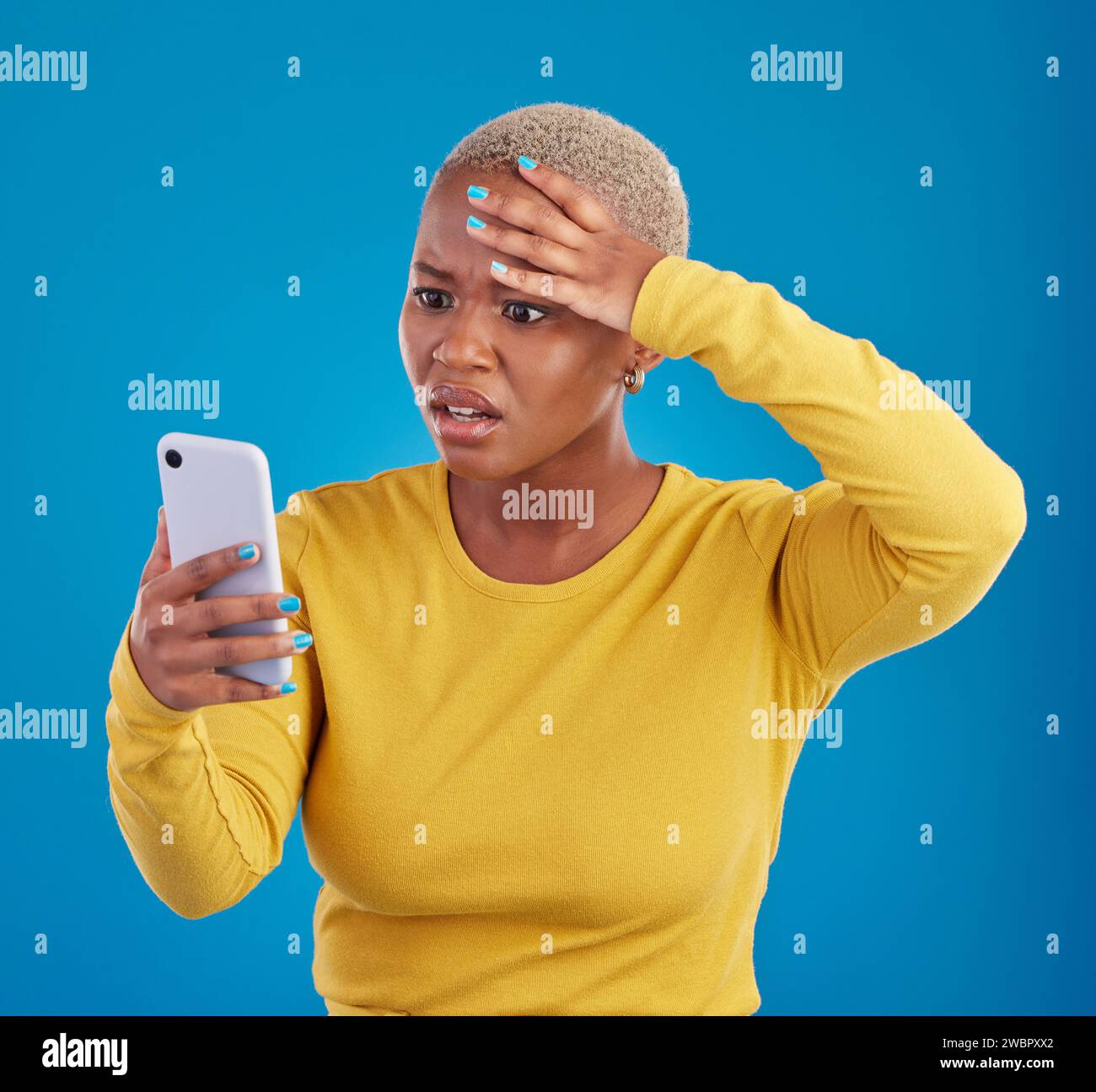 Wtf, phone and confused black woman in studio for fake news, social ...