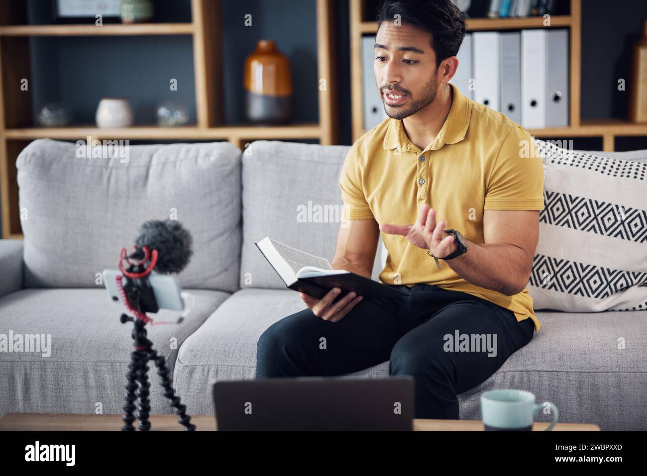 Book, bible study and phone with a man online to preach or reading ...