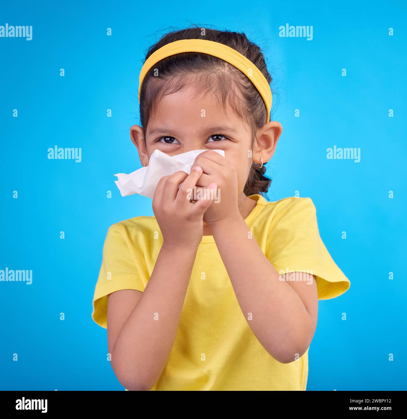 Sick, blowing nose and napkin with girl in studio for allergies ...