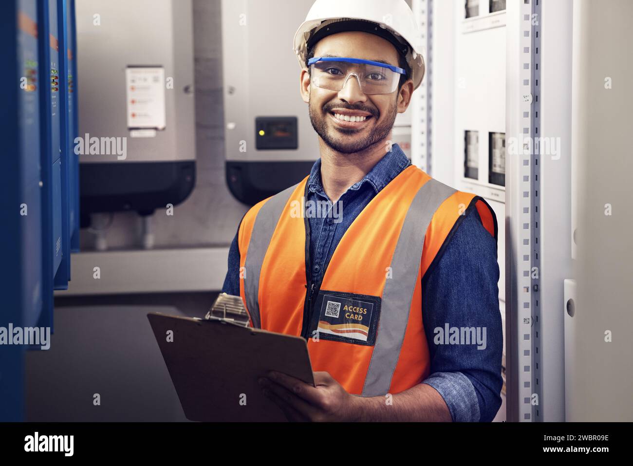 Portrait, happy man and engineering technician at control panel ...