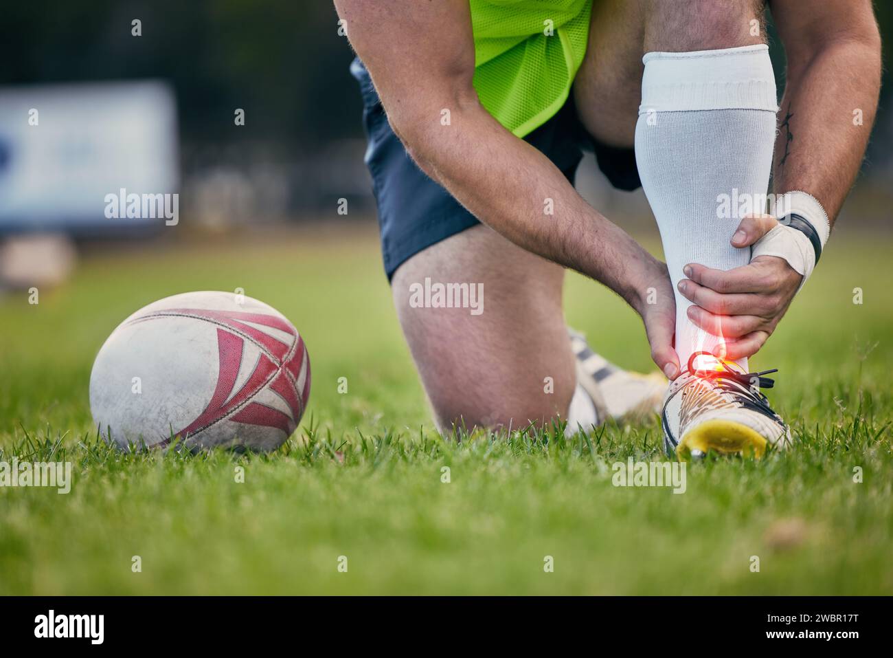 Rugby, pain and man with foot injury on sports field for practice match ...