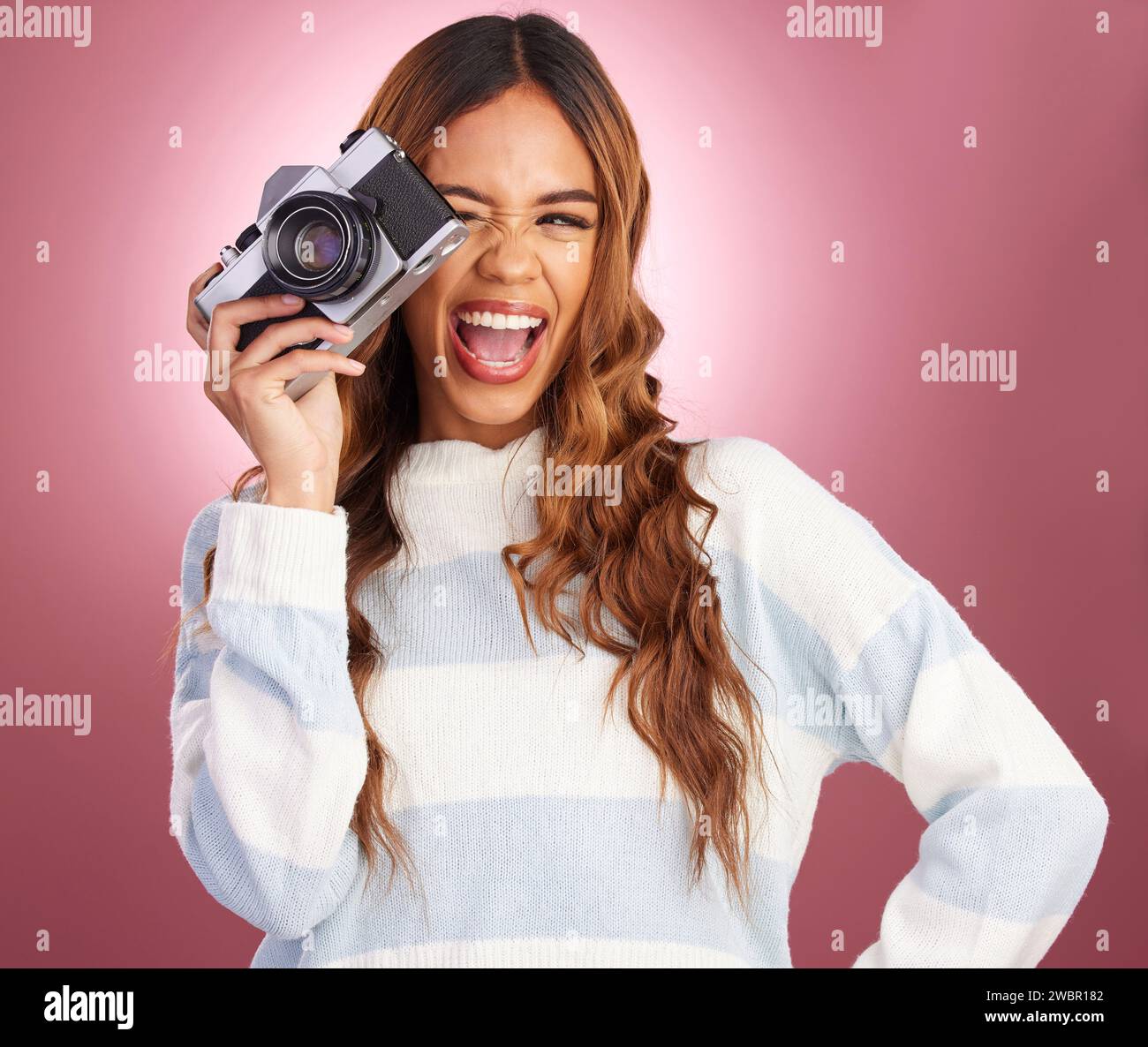 Camera, photography and happy woman in studio for fun, posing and gen z ...