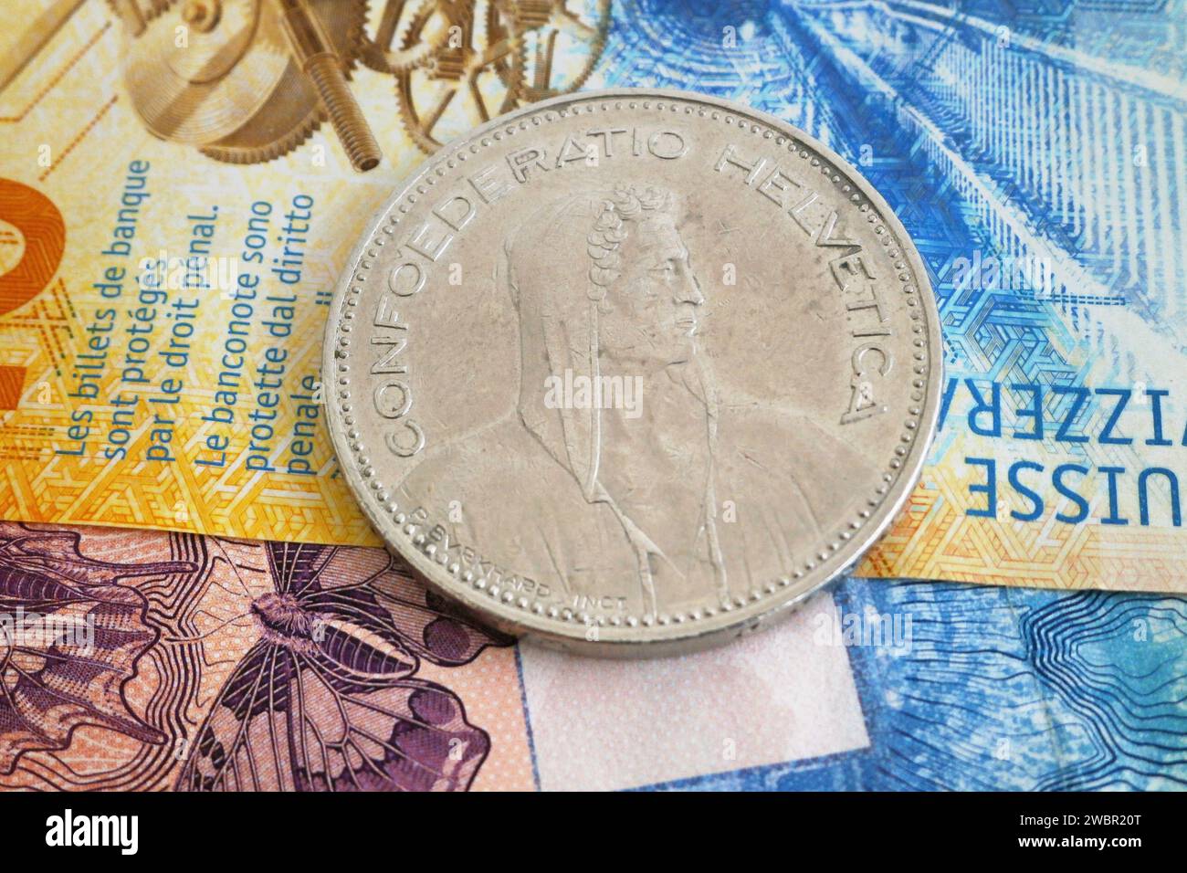 Swiss franc coin and banknotes as background Stock Photo - Alamy