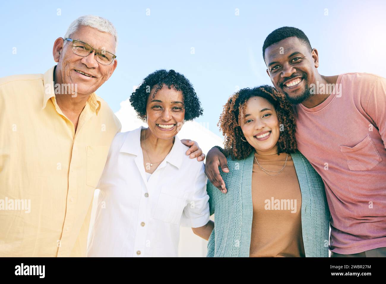 Family, generations in portrait with happiness outdoor, parents with ...