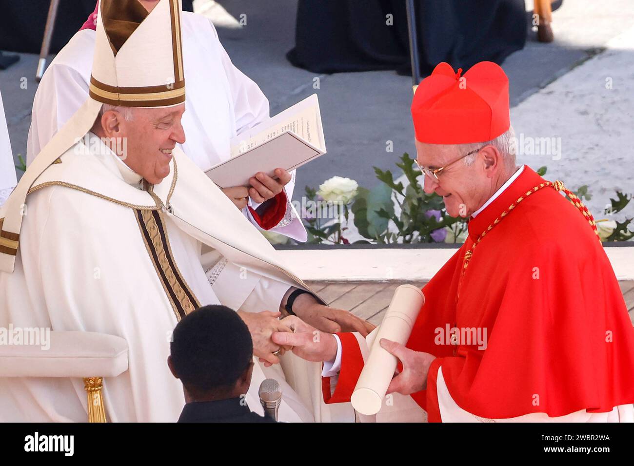 Pope Francis greets new cardinal Stephen Brislin during a consistory in ...