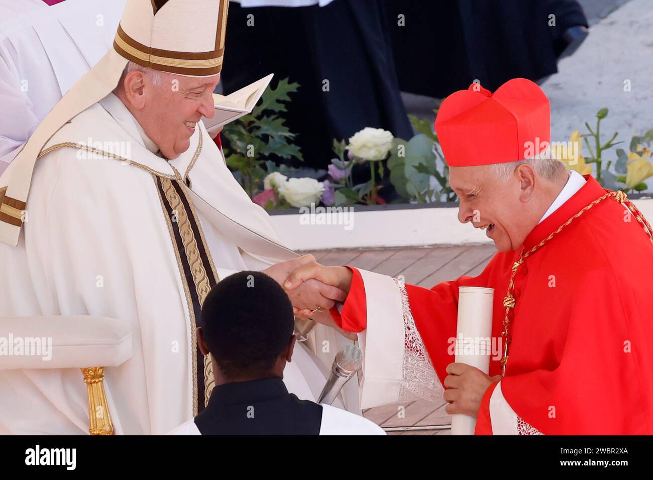 Pope Francis puts the red biretta greets new cardinal Diego Rafael ...