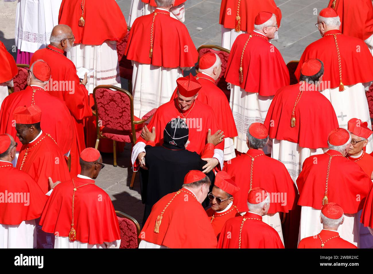 New cardinal Francois-Xavier Bustillo, center, at the end of a ...