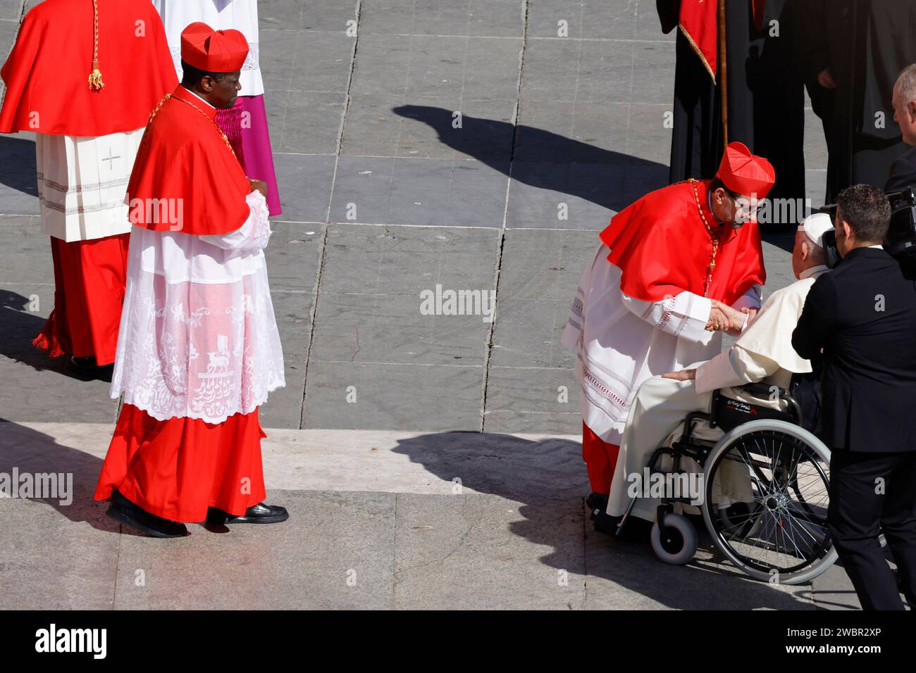 Pope Francis greets new cardinals JoseÕ Cobo Cano, center, and Protase ...