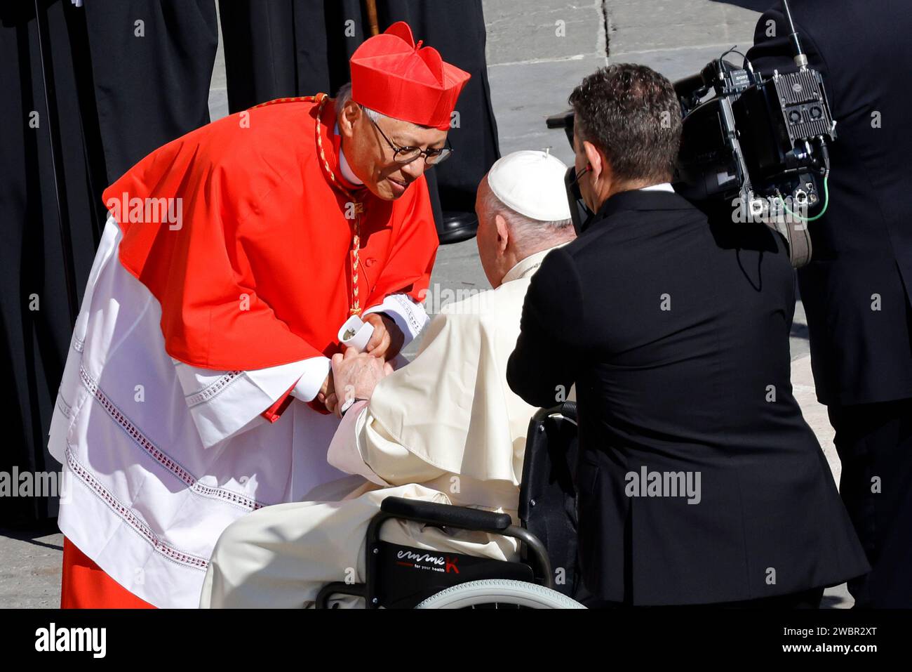 New cardinal Stephen Chow Sau-yan, of Honk Kong, greets Pope Francis at ...