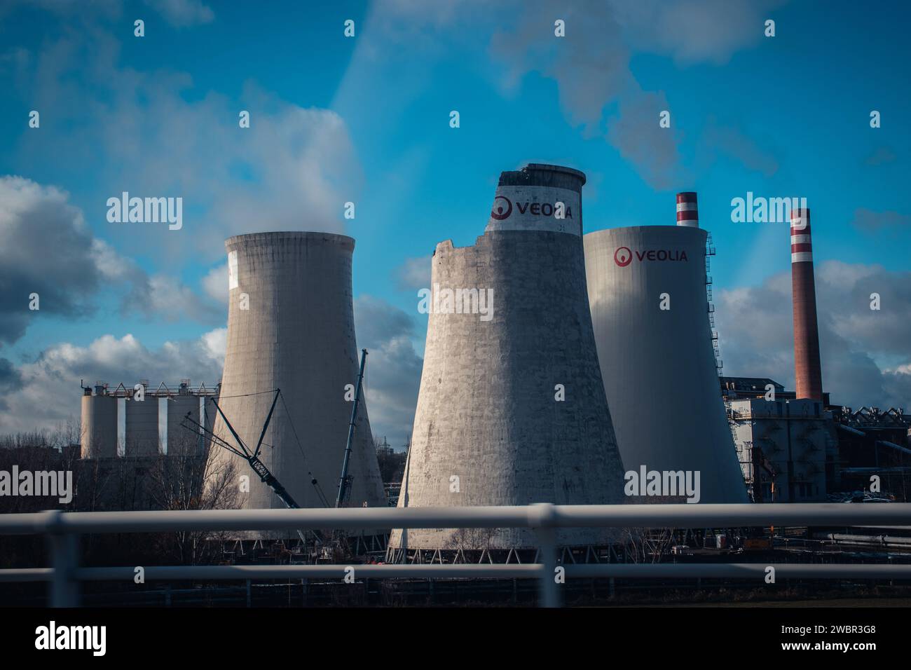 Building a nuclear power plant towers. Big chimneys beside road with ...