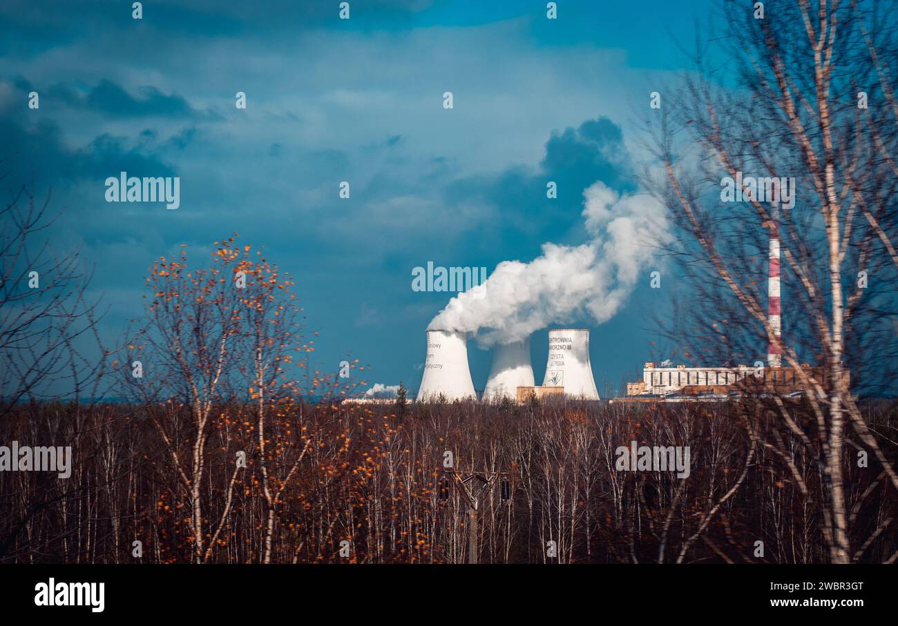 Nuclear power plant cooling towers concept photo. Big chimneys. Forest ...