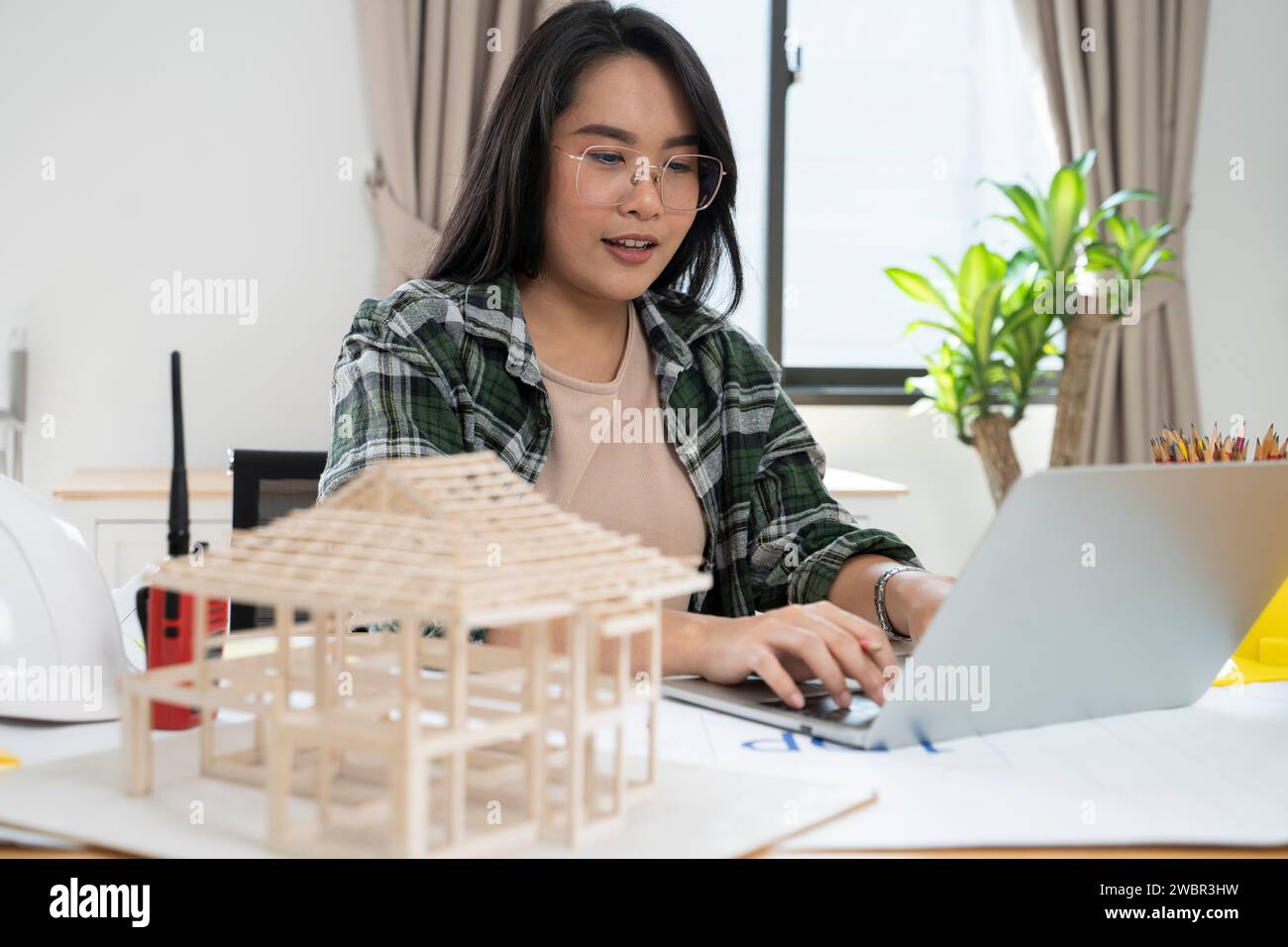 Young woman engineer working home hi-res stock photography and images ...