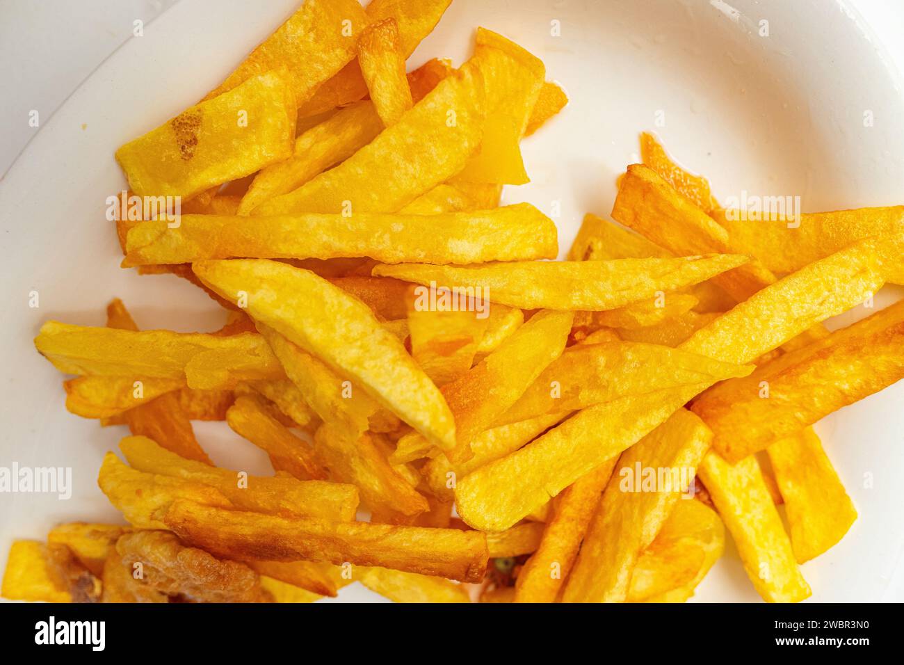 plate with a portion of french fries Stock Photo - Alamy