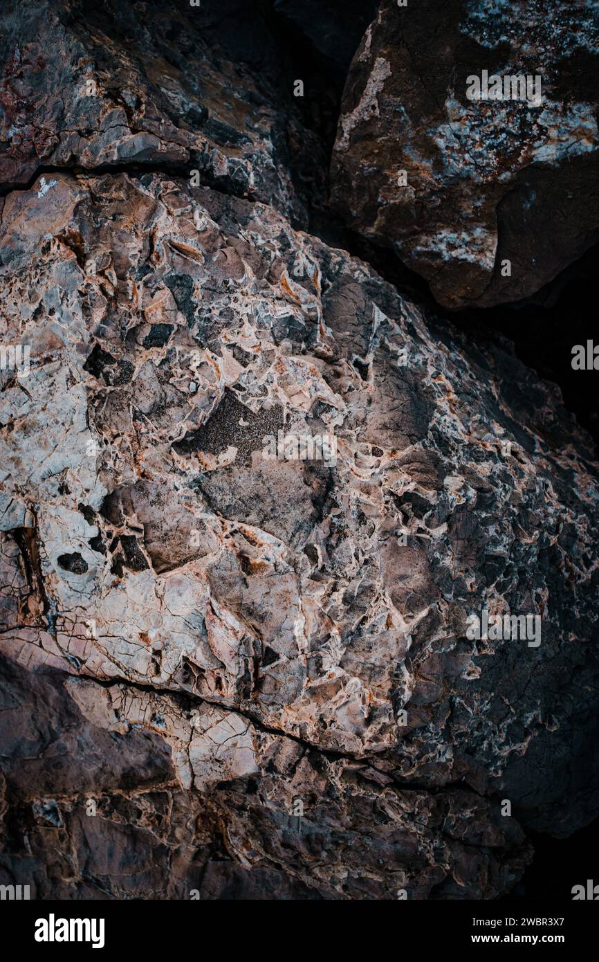 Light granite rock texture concept photo. Mountain rough surface. Close ...