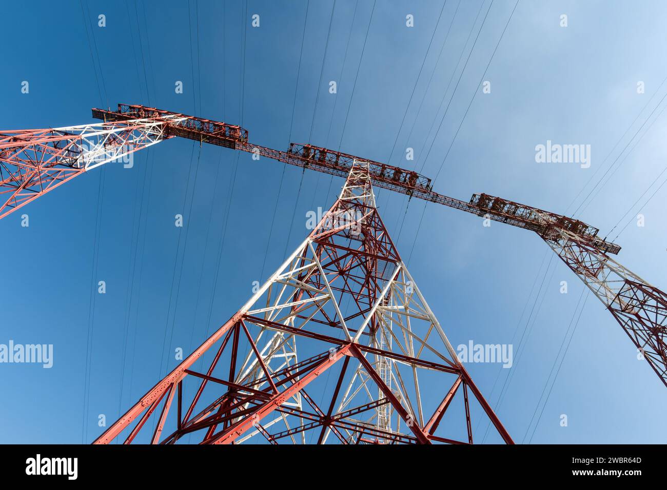 Tall electrical masts for transmitting high voltage current from a ...