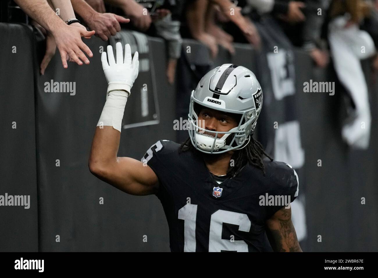 Las Vegas Raiders wide receiver Jakobi Meyers (16) is introduced before an NFL football game ...