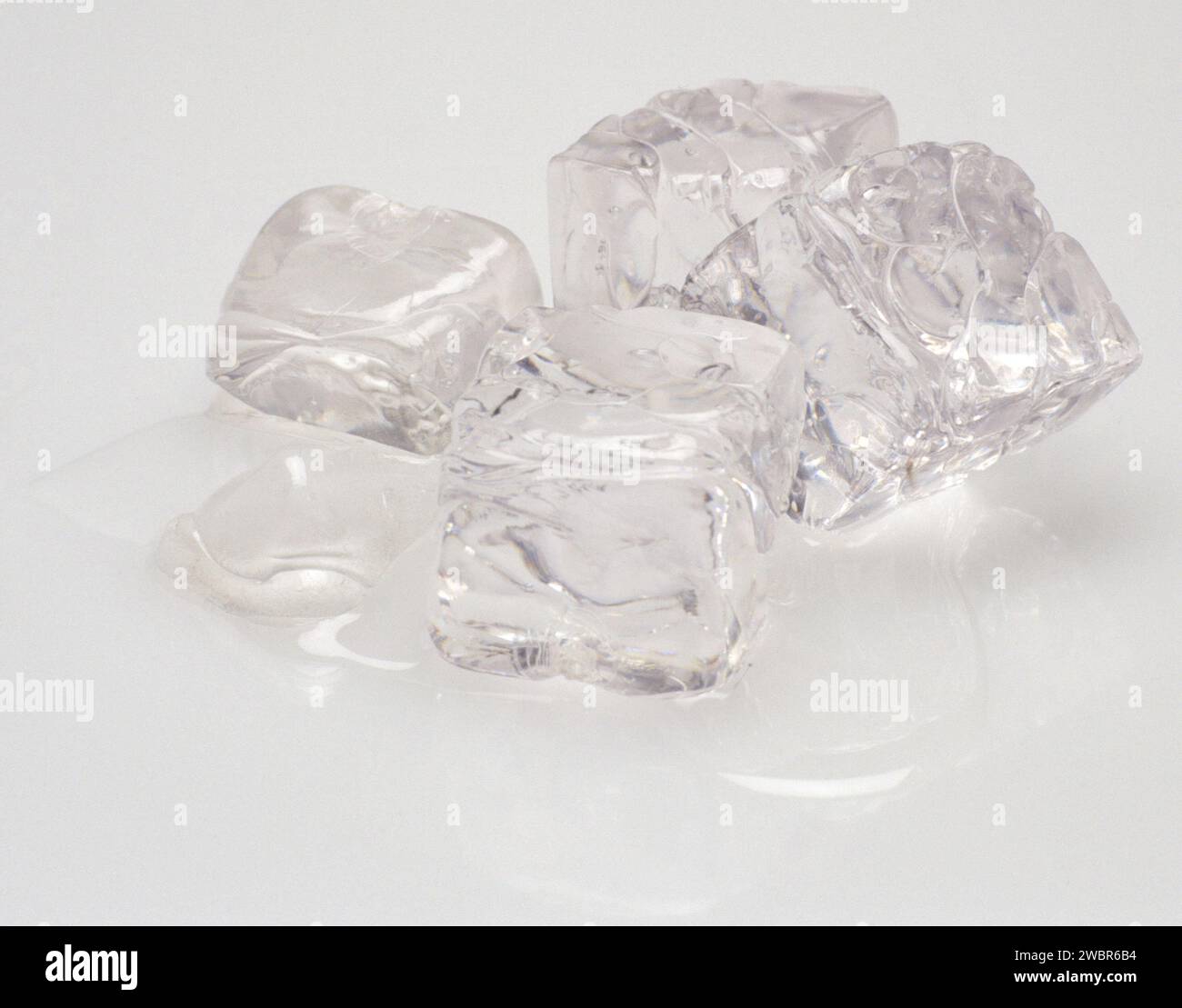 Melting Ice cubes on white background Stock Photo - Alamy