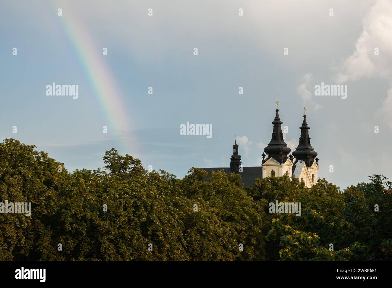 Rainbow over Church and Monastery of Discalced Carmelites Stock Photo ...